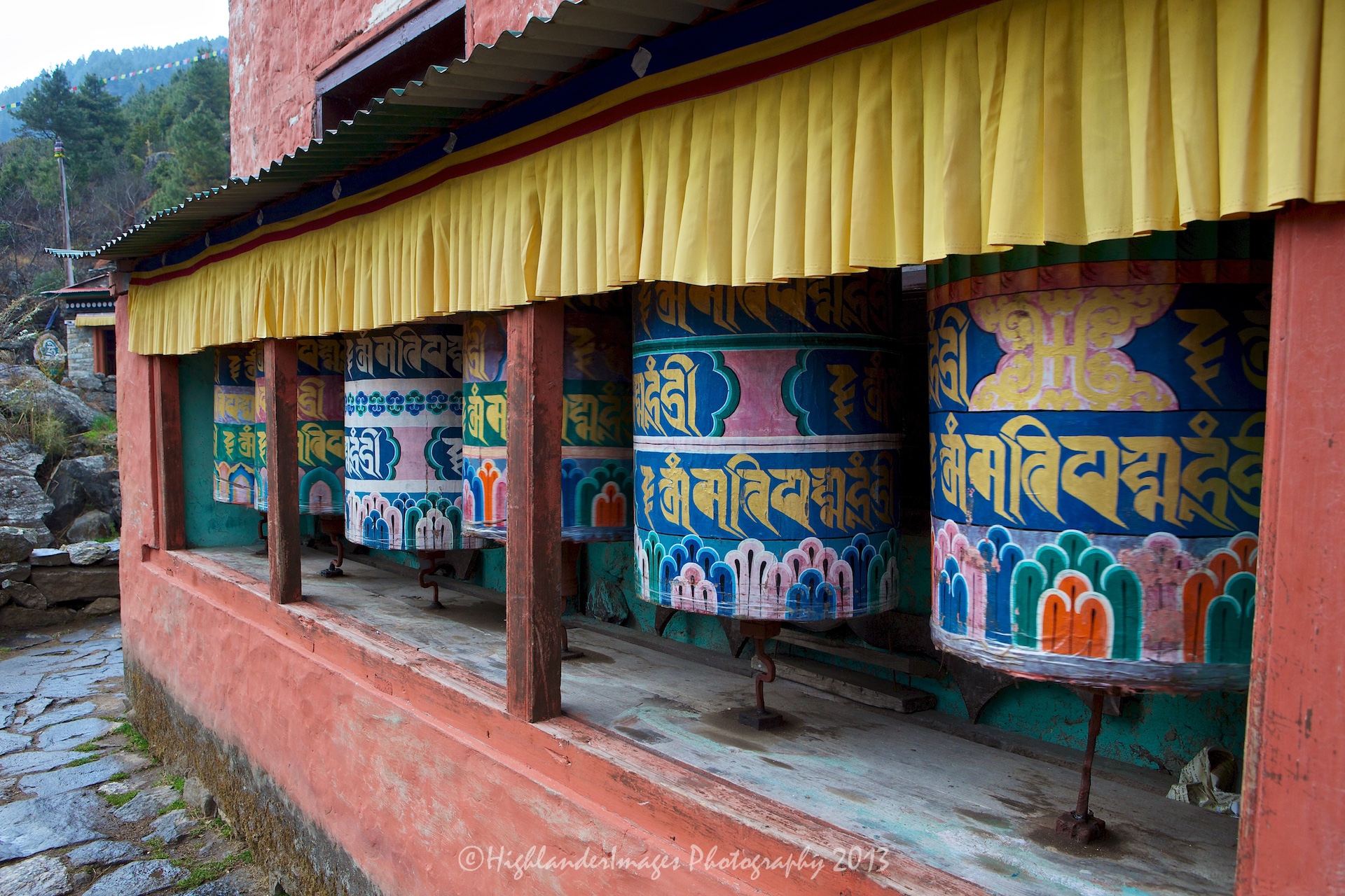 Prayer wheels between Koshigaun village and Phakding – highlanderimages ...
