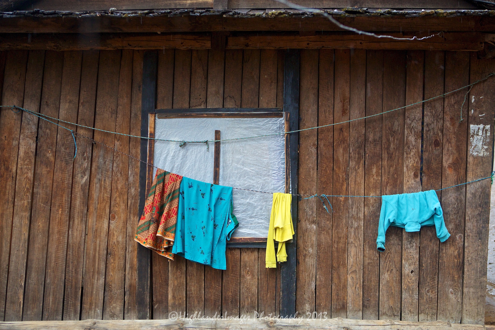 Washing hung up in the rain at Phakding. – highlanderimages photography